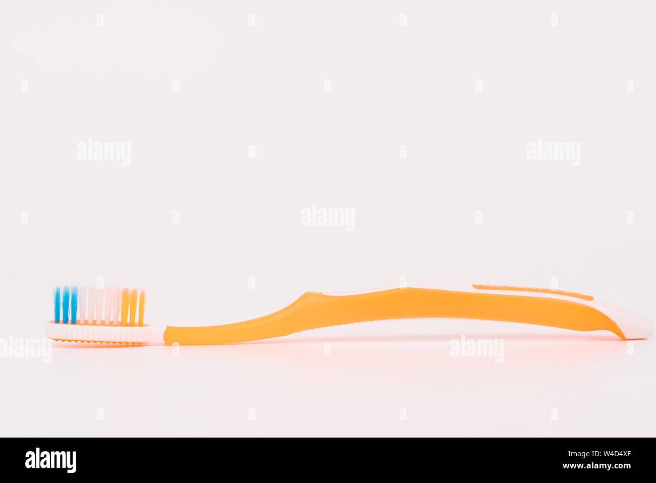 toothbrush on white background Stock Photo - Alamy