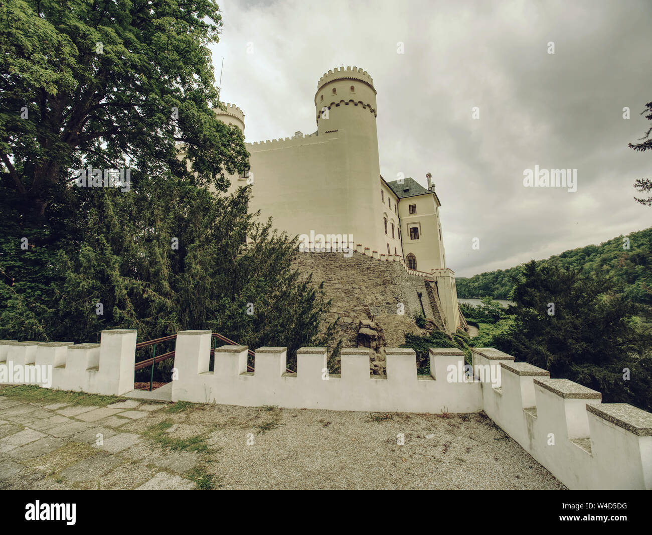 Orlik castle or chateau above water of Orlik dam. Popular Schwarzenberg ...