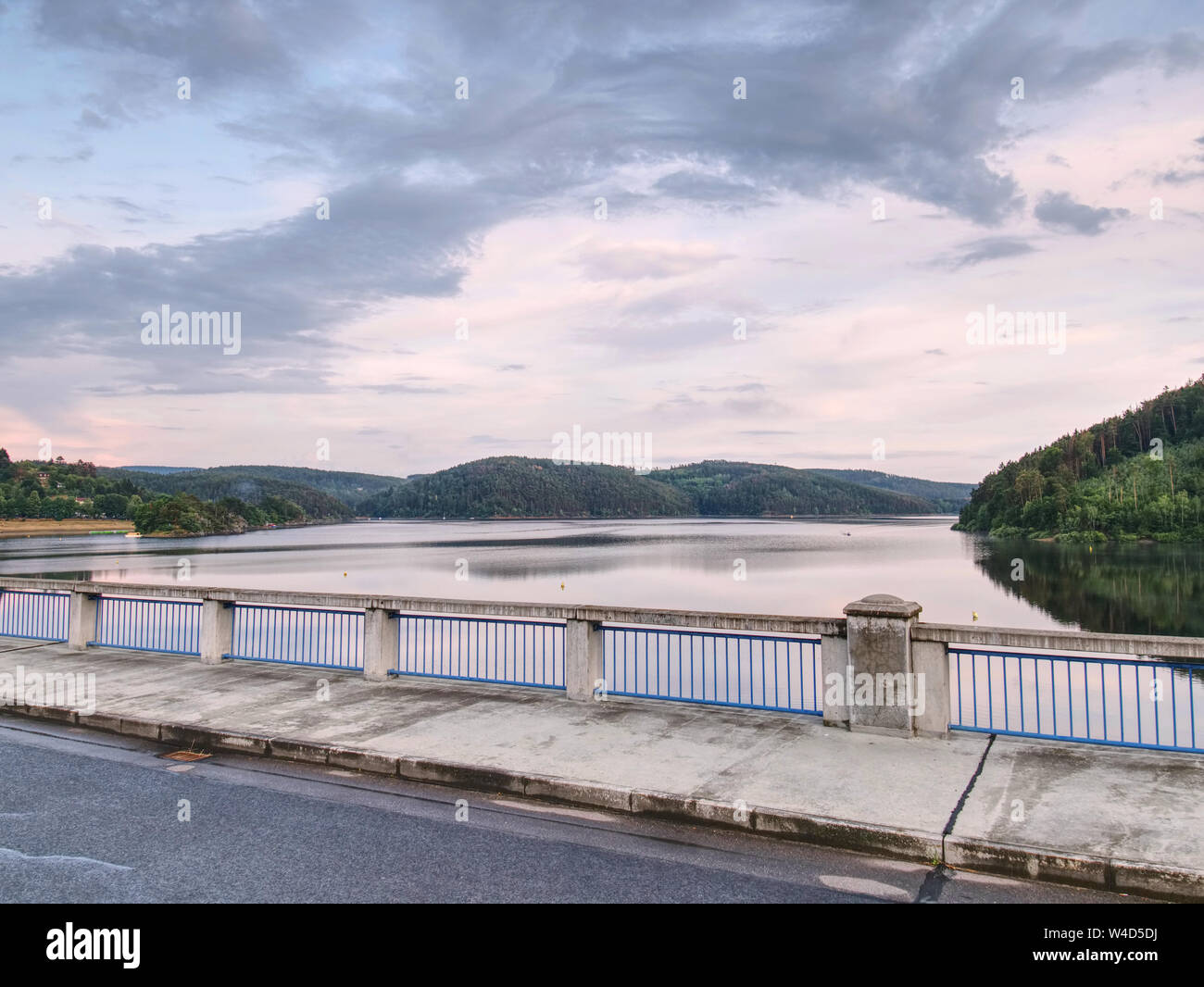 Asphalt road on dam bridge above Orlik Dam on the Vltava river Stock ...