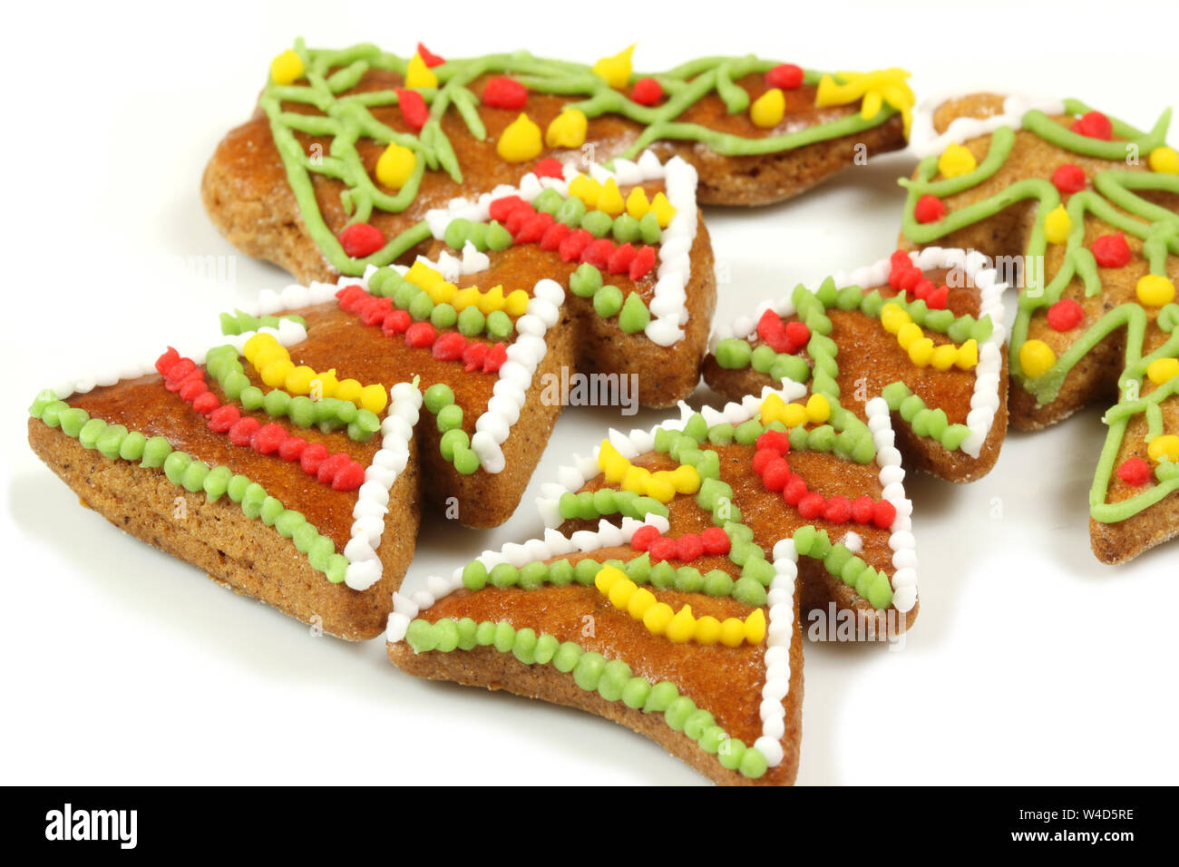 Christmas gingerbread trees with beautiful colorful icing decoration ...