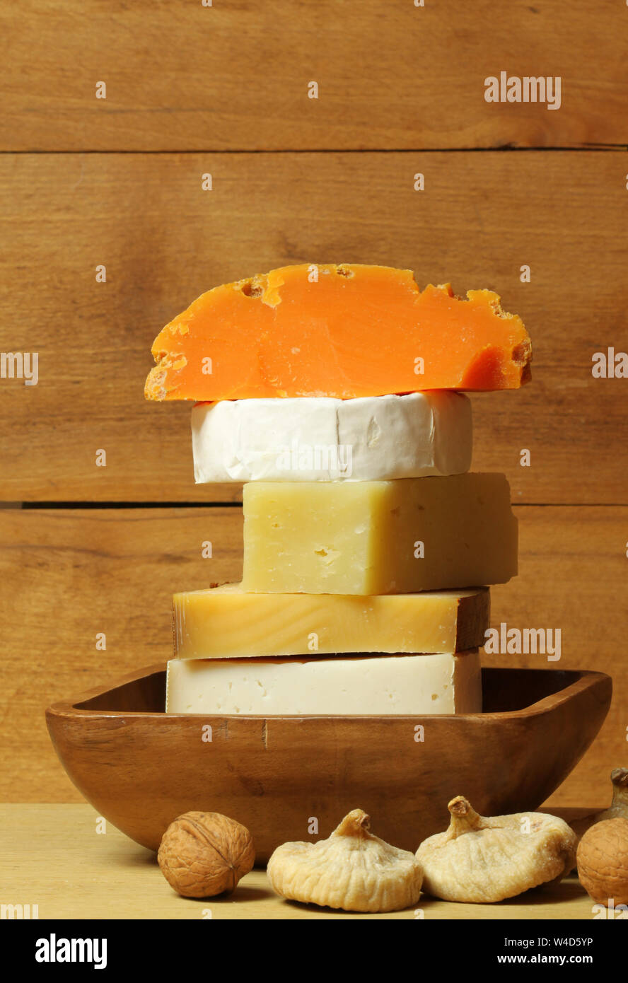 Cheese and appetizers in vintage style Stock Photo - Alamy