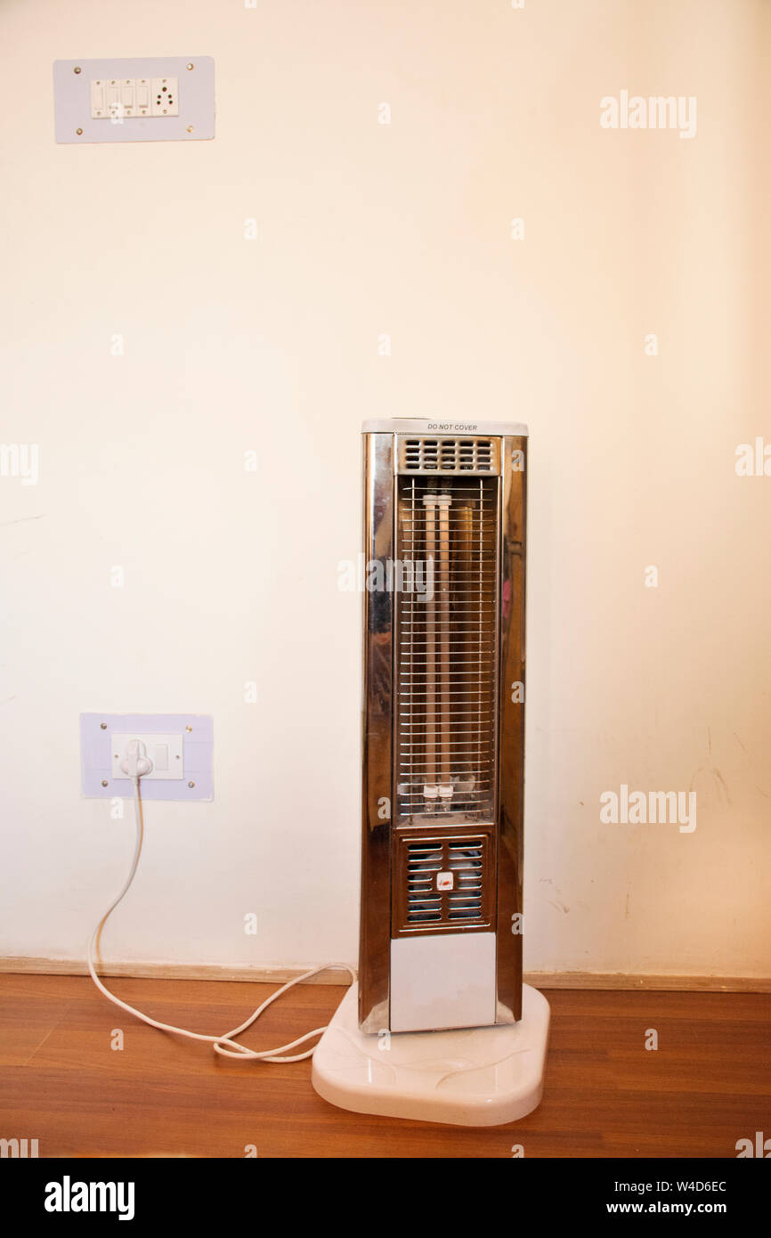 Classic retro electric heater of Indian and tibetan people in living ...