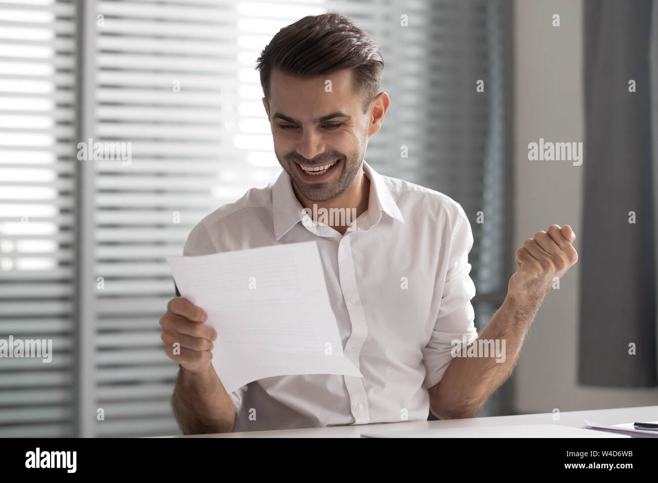 Businessman reading mail hi-res stock photography and images - Alamy
