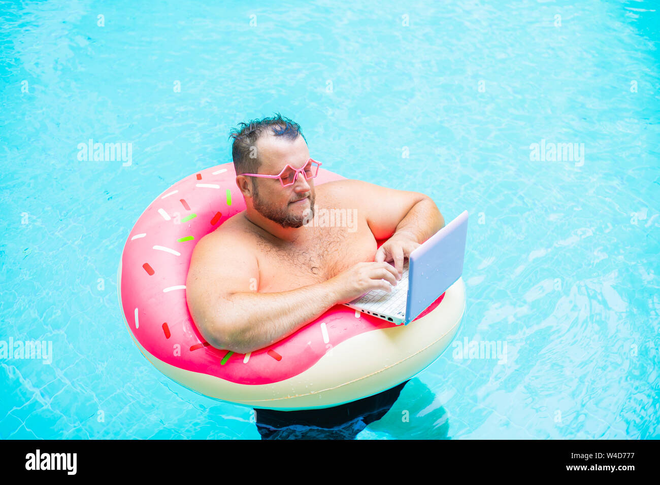 Business man swimming pool inflatable hi-res stock photography and ...