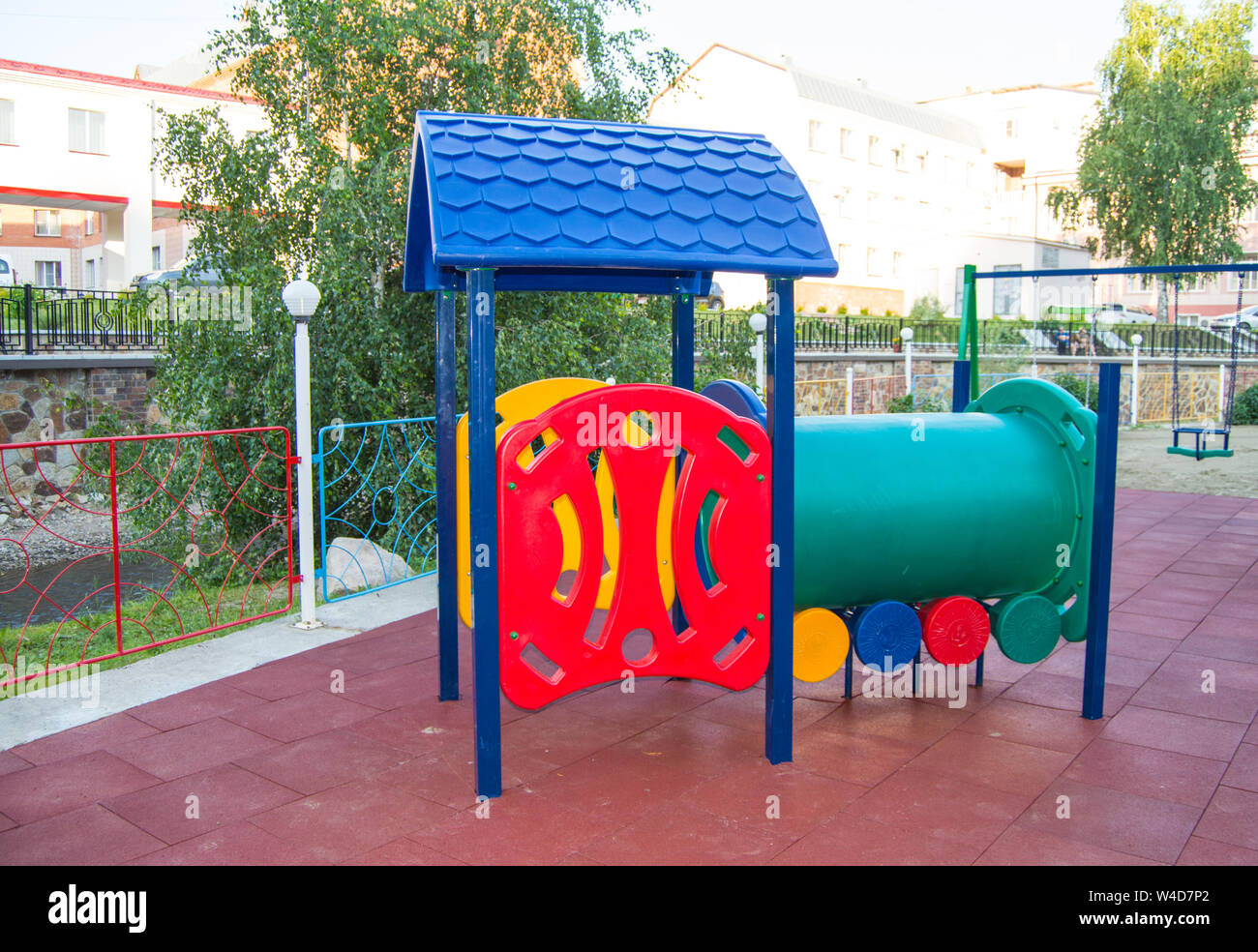 Children's Playground with funny train made of multi-colored plastic ...
