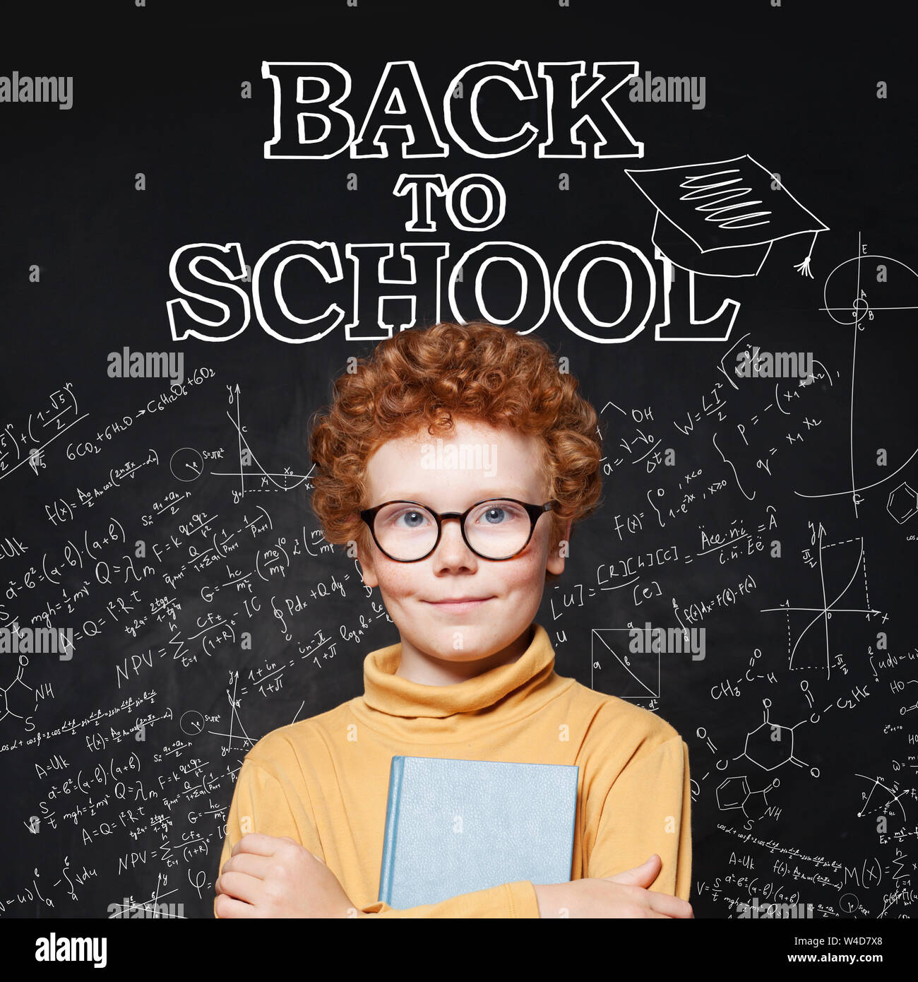 Smiling child smart student on Back to school chalkboard background ...