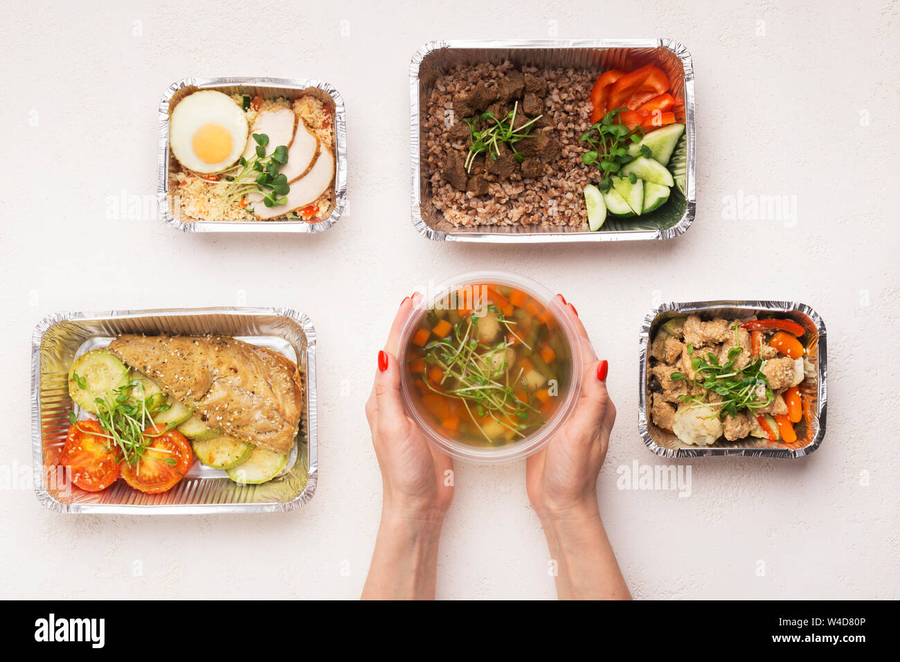 Daily ration of healthy food on white background Stock Photo - Alamy