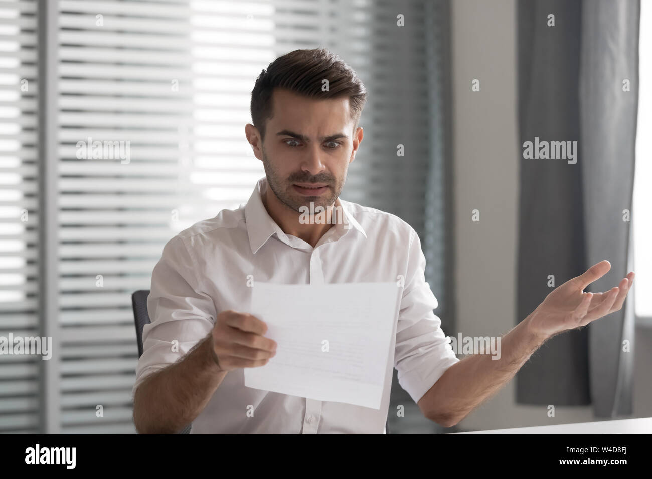Man shocked letter hi-res stock photography and images - Alamy