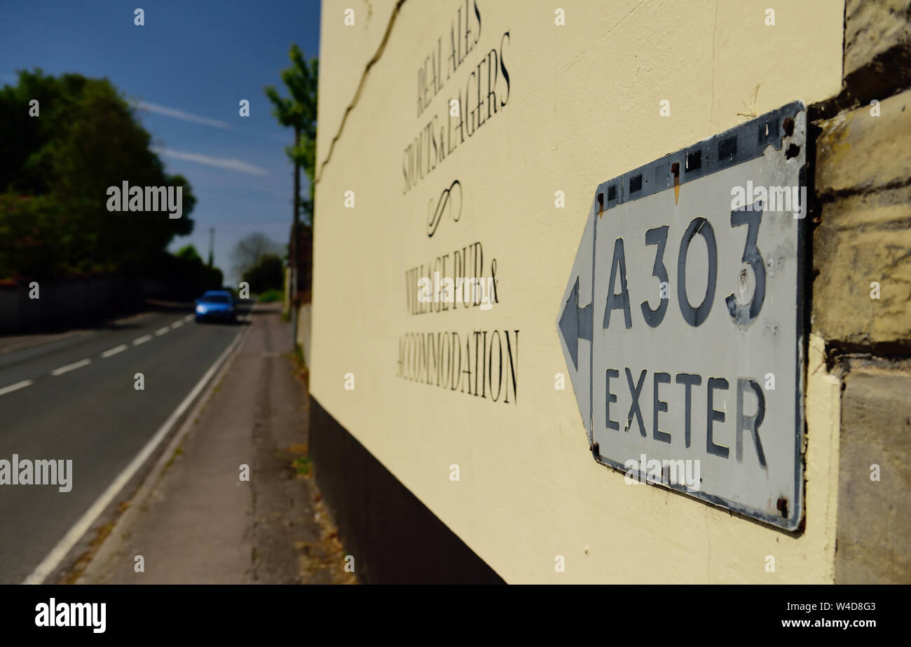A303 road sign on the wall of the Angel Inn at Hindon, Wiltshire Stock ...