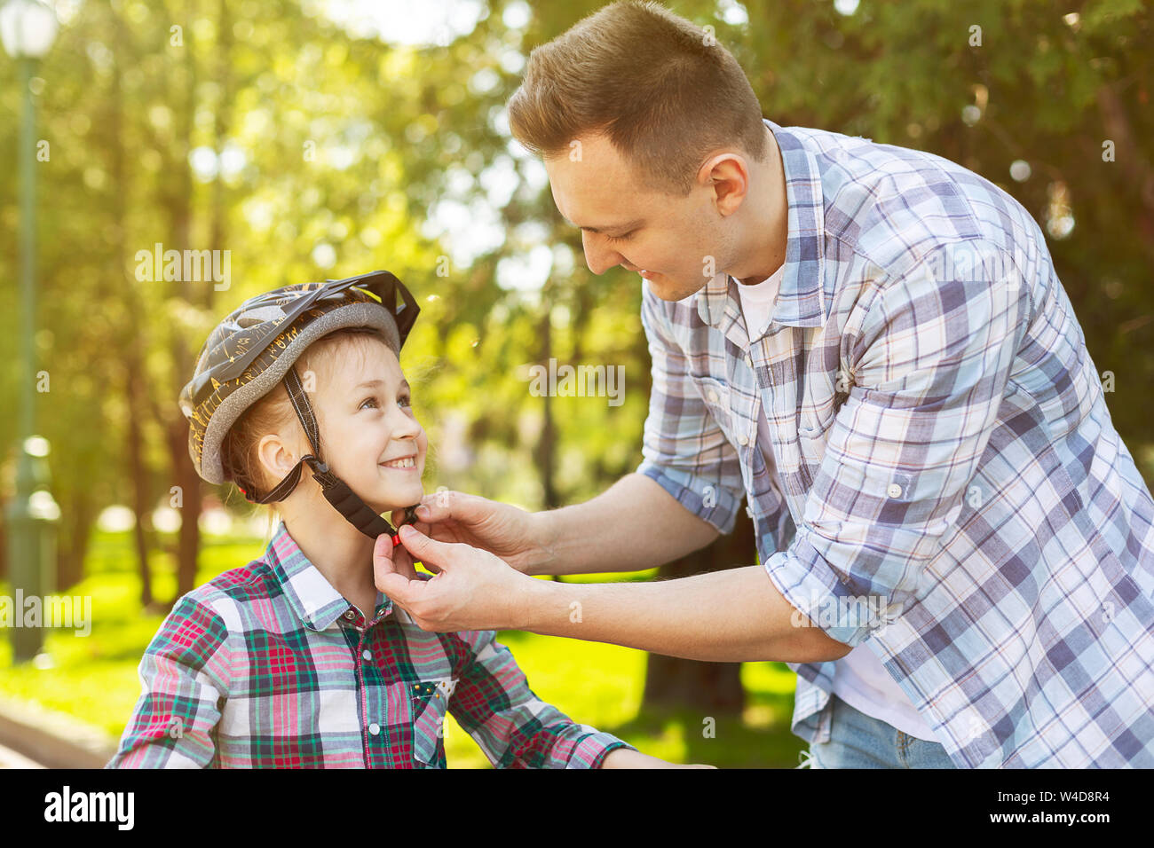 Thoughtful dad is taking care of his little girl Stock Photo - Alamy