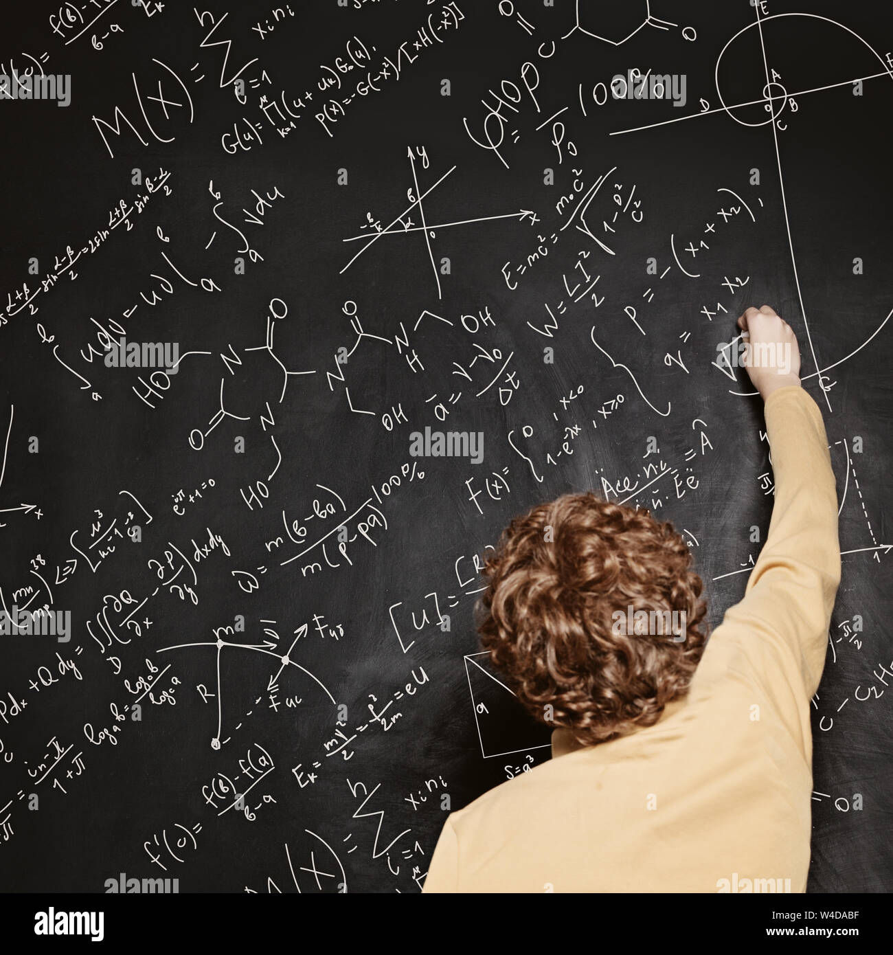 Student little boy and science background Stock Photo - Alamy