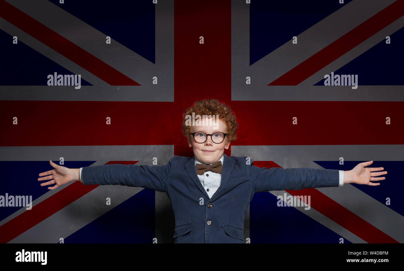 Welcome to english language school. Happy child boy student against the ...