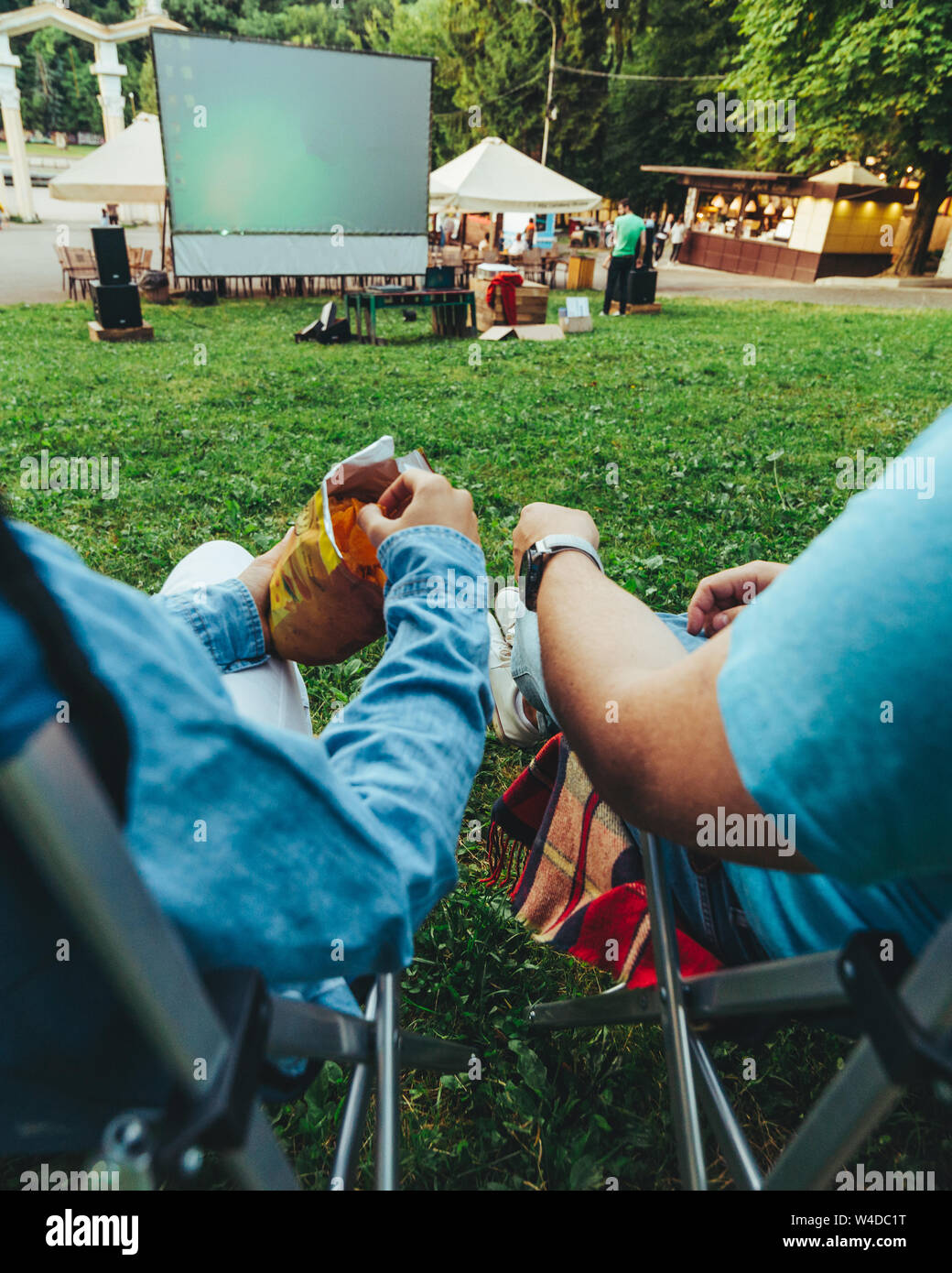 eating snacks drinking beer movie in open air cinema copy space Stock ...