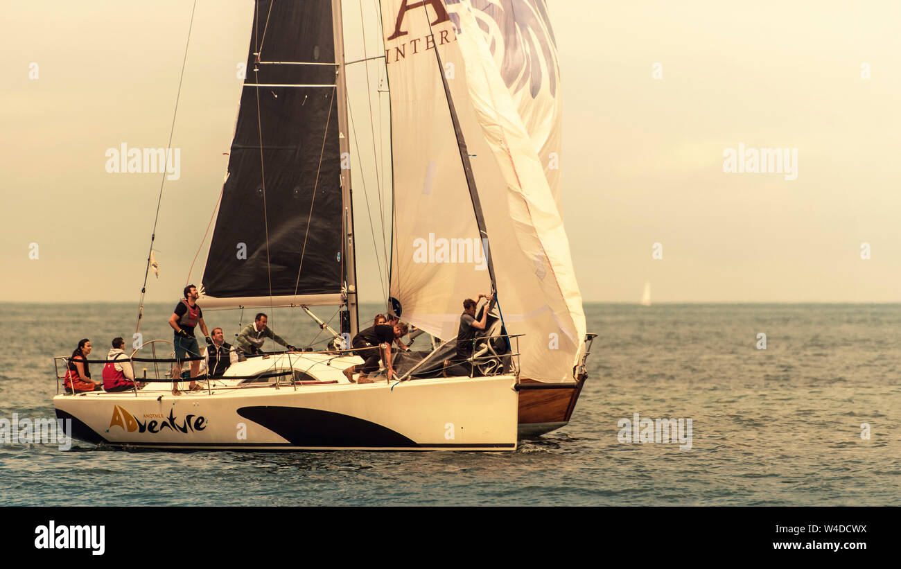 Sailing together. Rounding the buoy. Group of sailboats approached ...