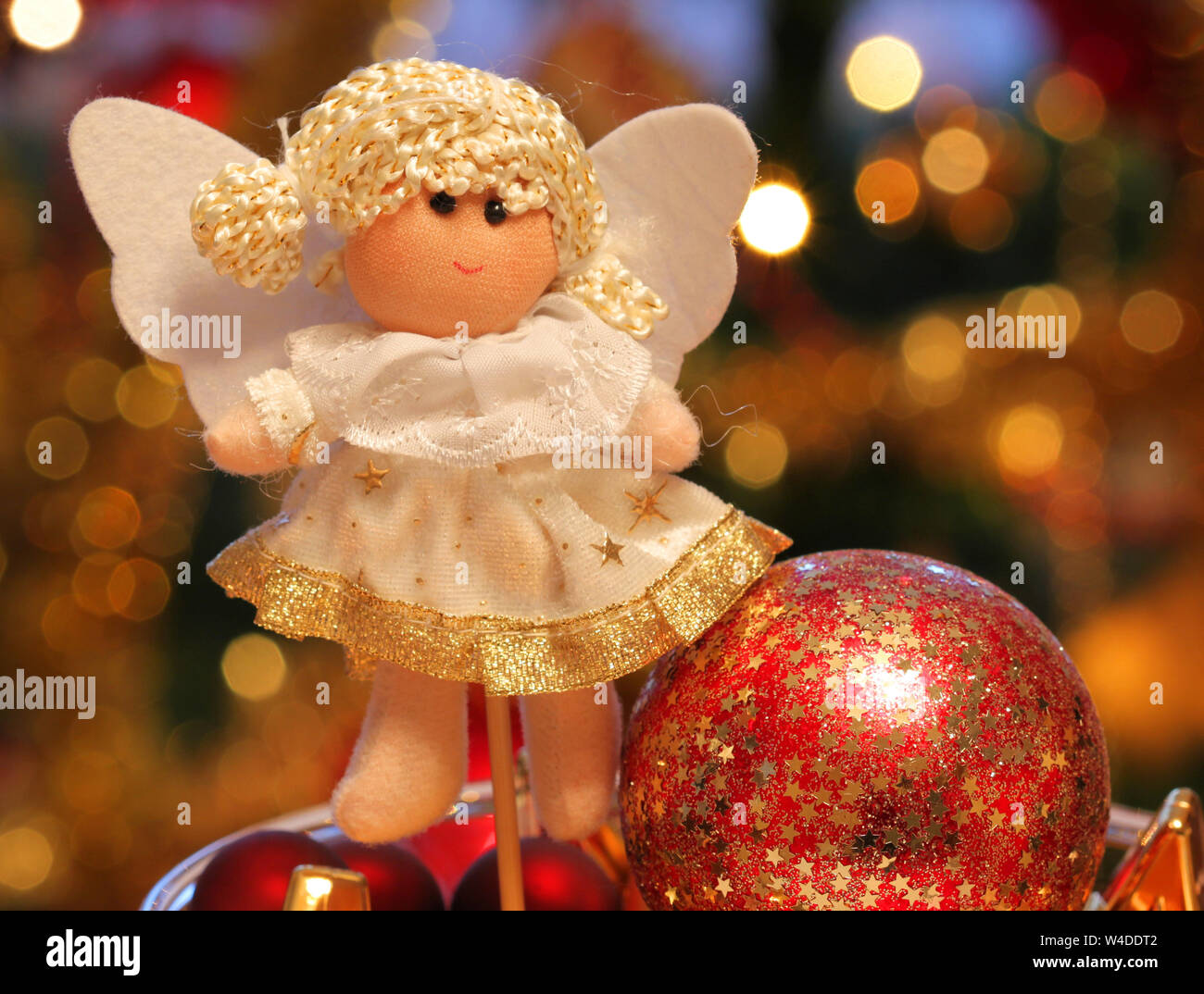 Christmas angel with glass balls decoration Stock Photo - Alamy