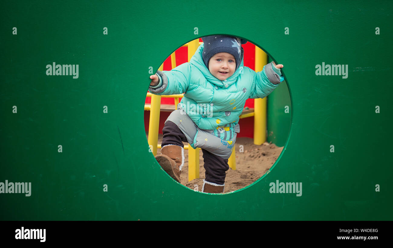 Happy child run and playing in the playground Stock Photo - Alamy