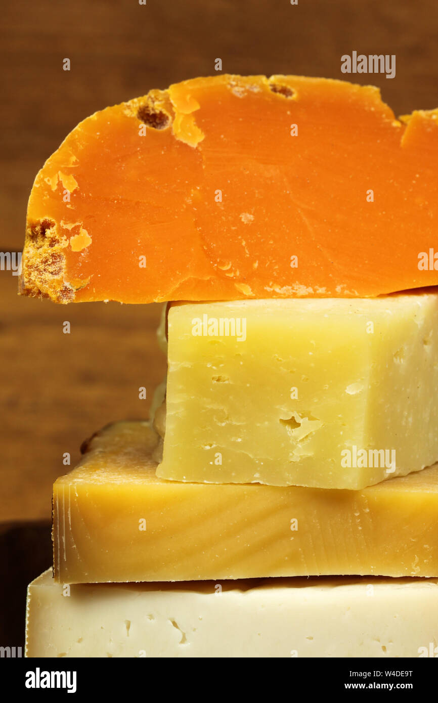 Closeup of various kinds of hard cheese Stock Photo - Alamy