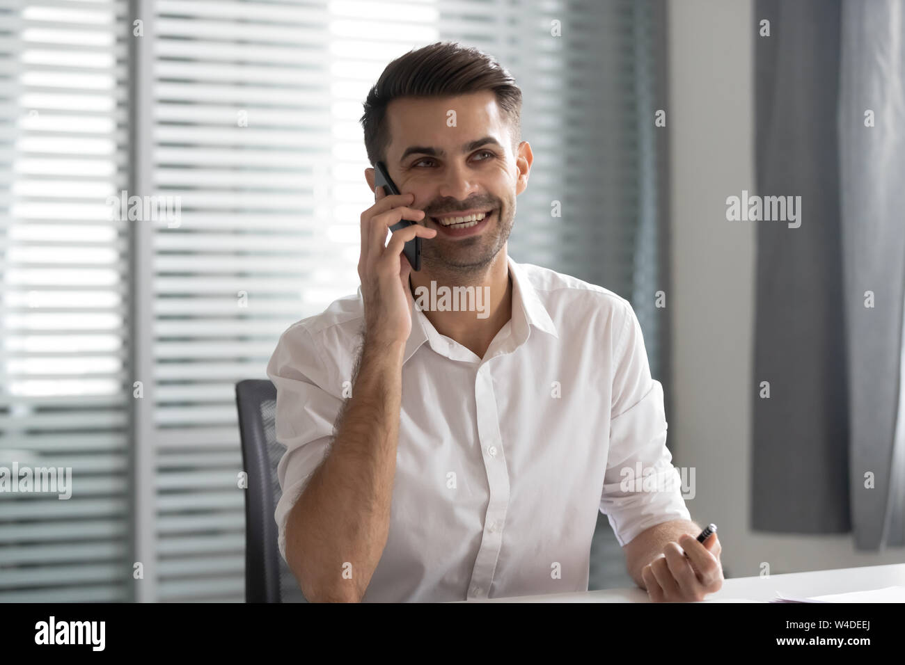 Business customer support guy smiling hi-res stock photography and ...