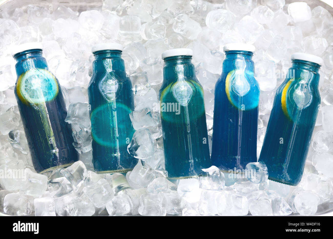 Set of Refreshing blue detox lemonade with lemon in glass jar Stock ...