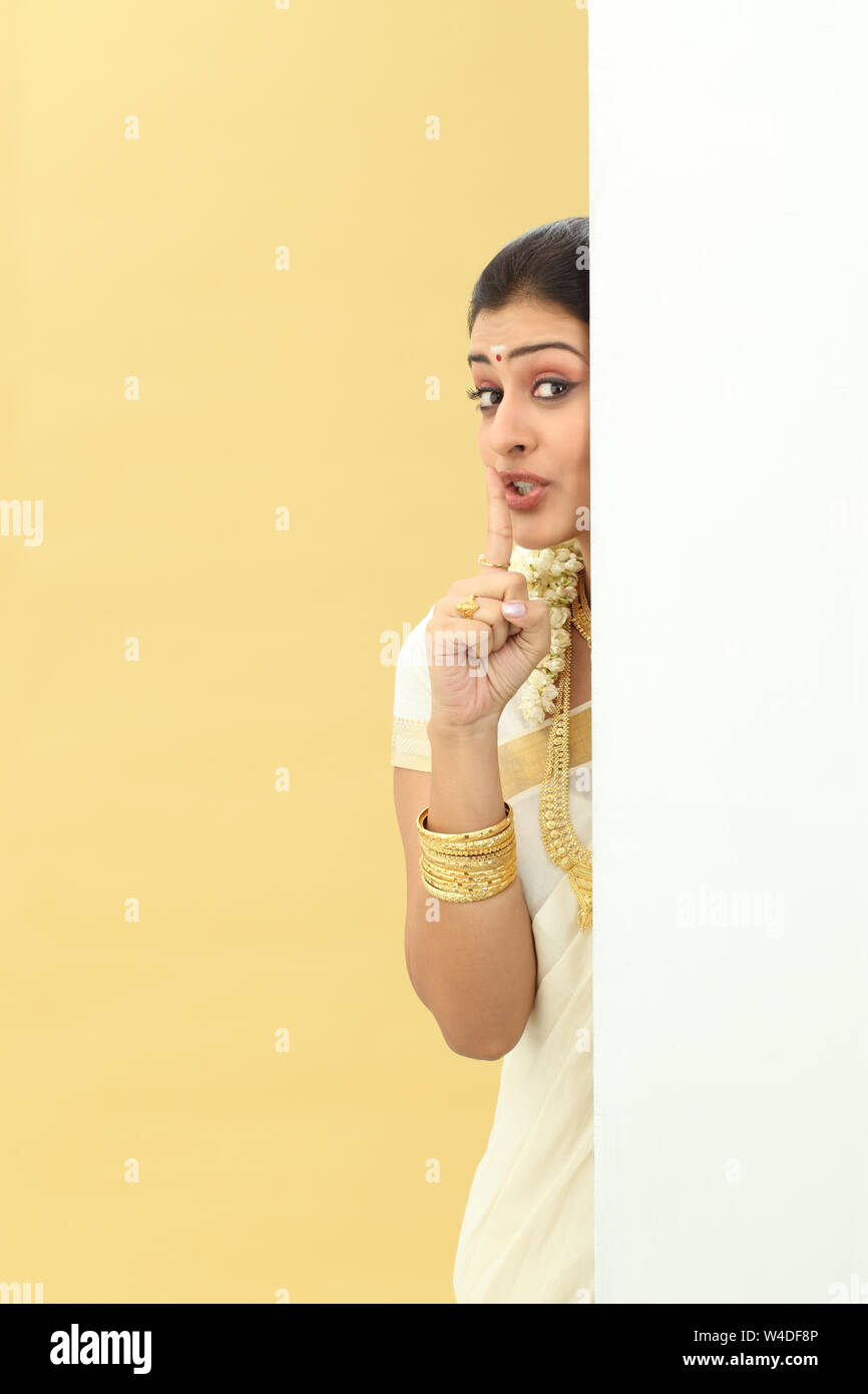 Finger on lips india hi-res stock photography and images - Alamy