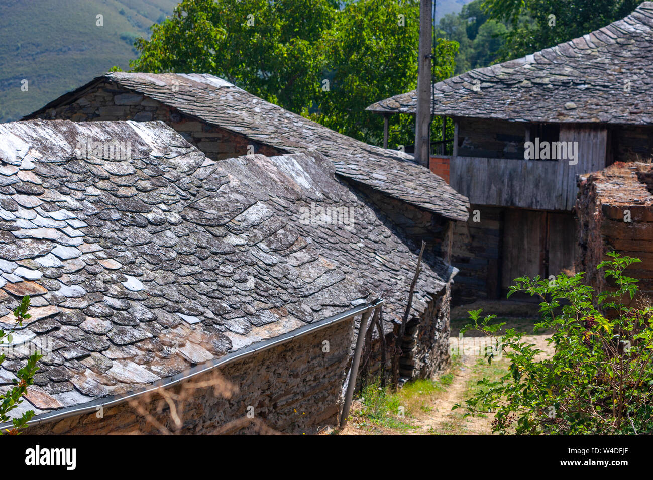 Rural village with slate roof and stone houses of Penoselo, El Bierzo ...