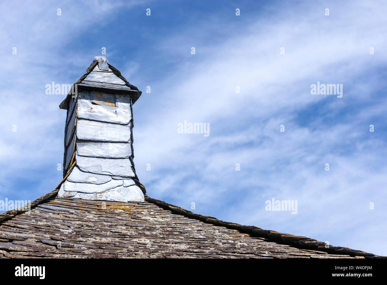 Chimney with slate. Rural village with slate roof and stone houses of ...