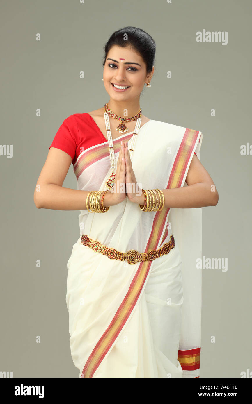 Indian woman joined hands welcome hi-res stock photography and images ...