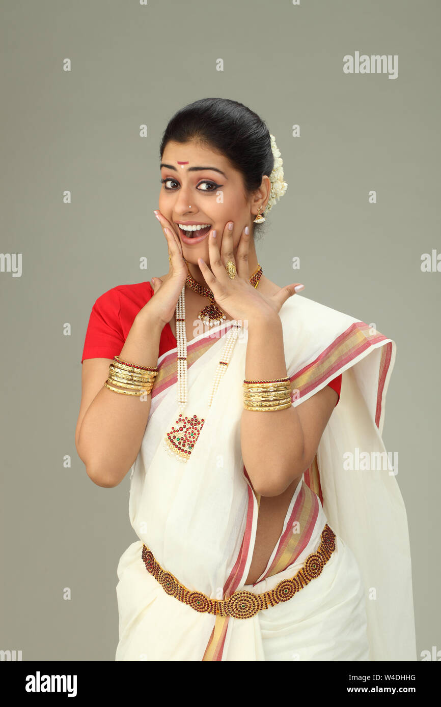 South Indian woman looking shocked Stock Photo - Alamy