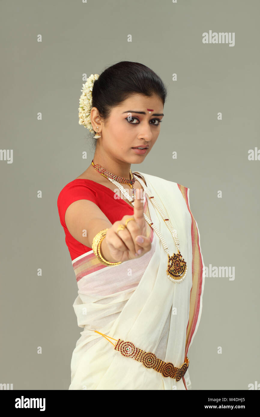 South Indian woman pointing finger Stock Photo - Alamy