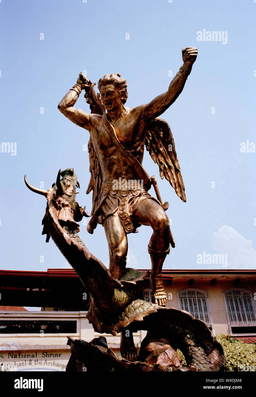 St Michael the Archangel slaying a dragon outside San Miguel Church ...