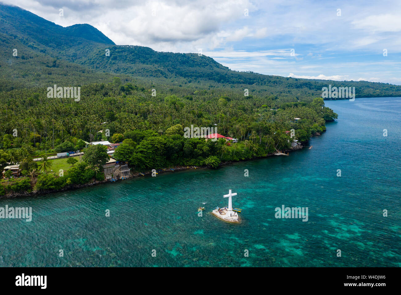 Aerial view of the sunken cemetery off the coast of the green volcanic ...