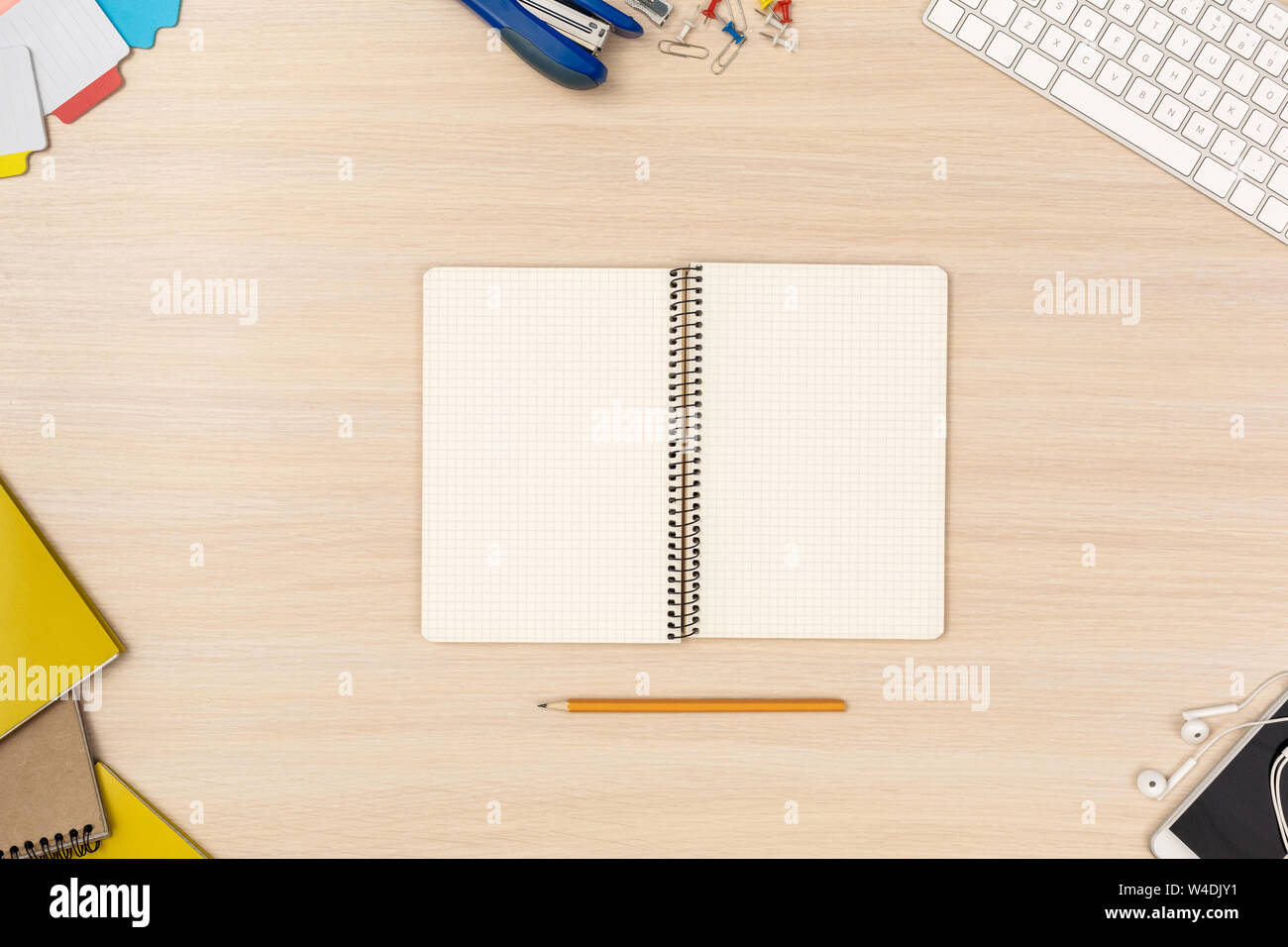 Workspace. Desk notebook and pencil top view no people Stock Photo - Alamy