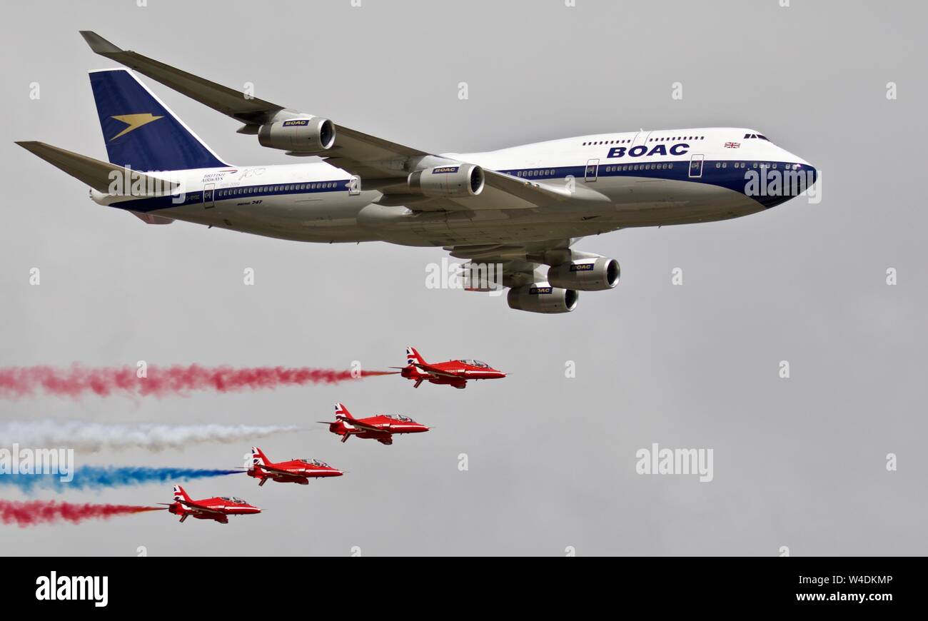 British Airways Boeing 747 and the Red Arrows performing a special ...