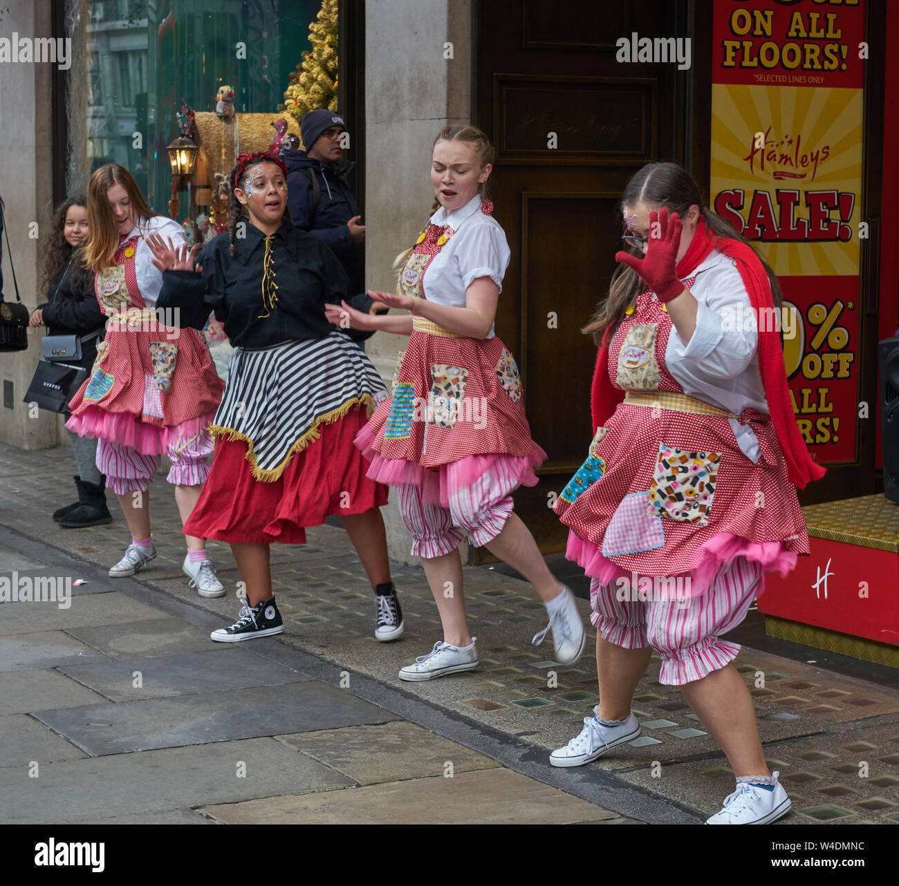 Hamleys staff dance outside shop hi-res stock photography and images ...