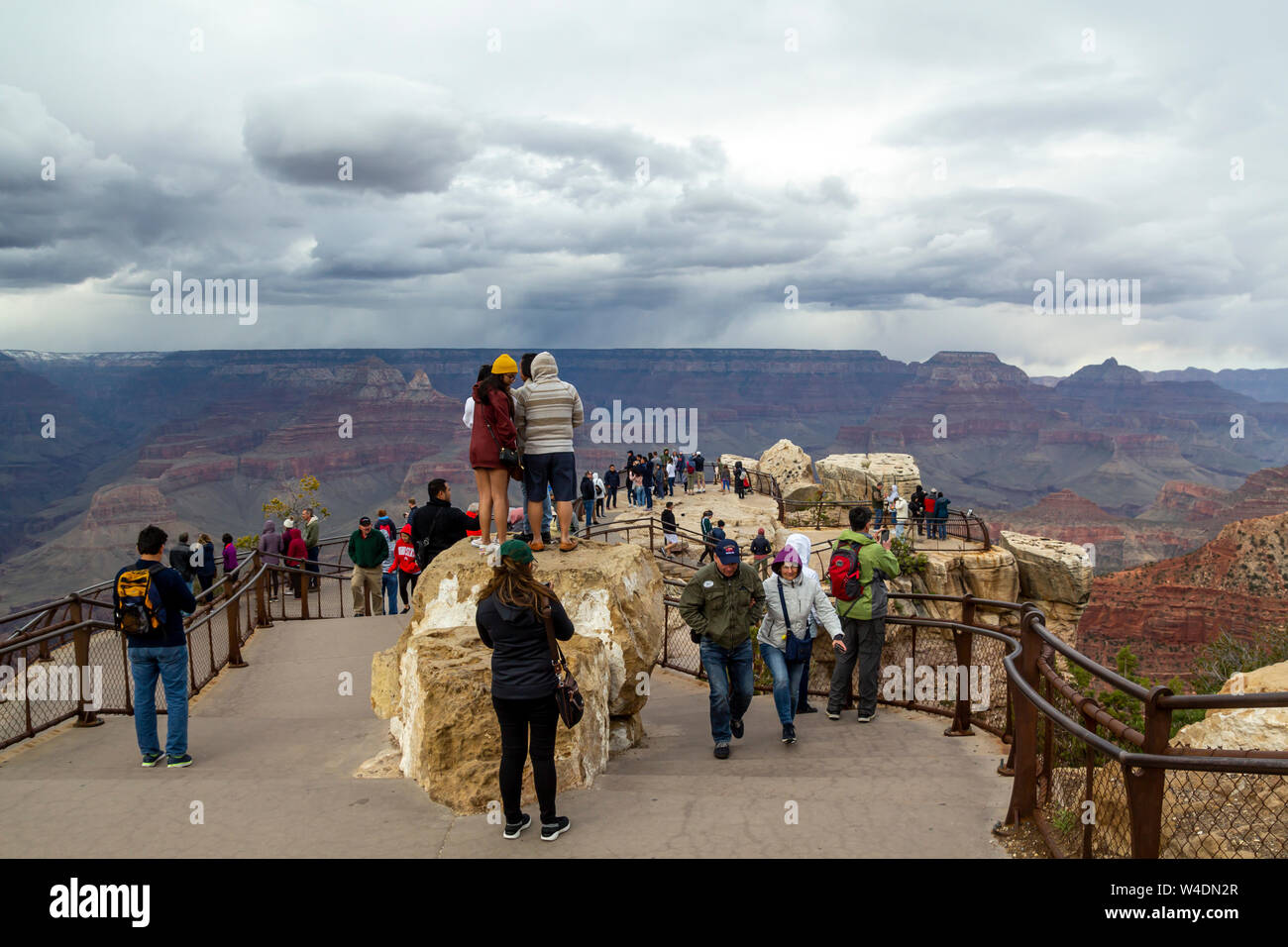 People at a scenic lookout with great views in the Grand Canyon ...