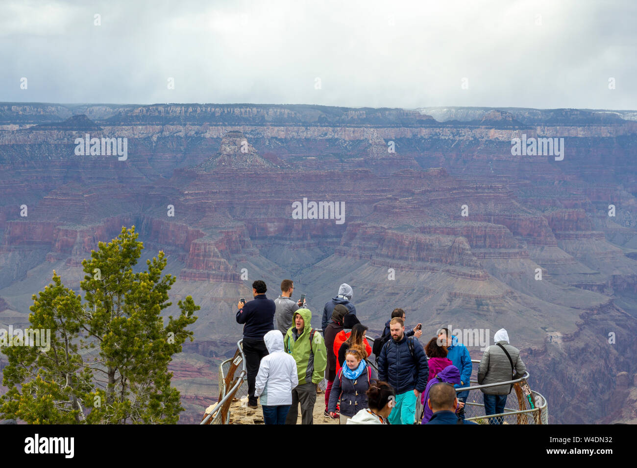 People at a scenic lookout with great views in the Grand Canyon ...