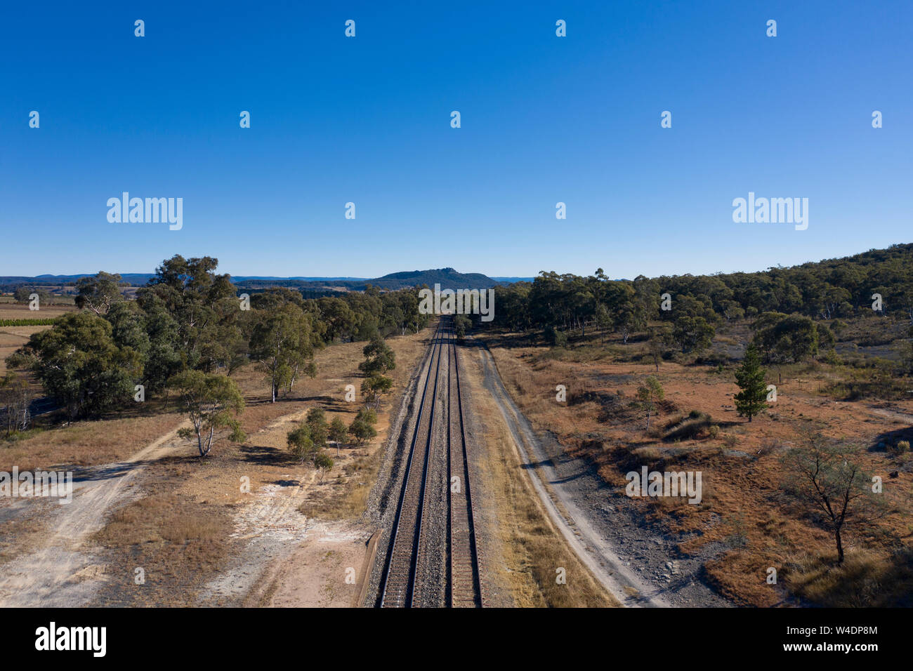 Railway tracks heading into the Australian outback Stock Photo - Alamy