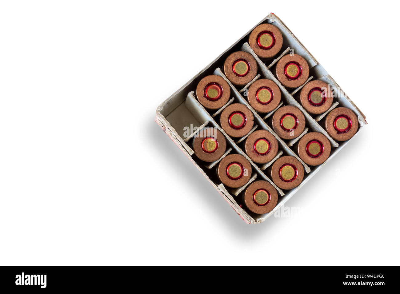 Open box of gun cartridges on isolated background. One cell is empty as ...