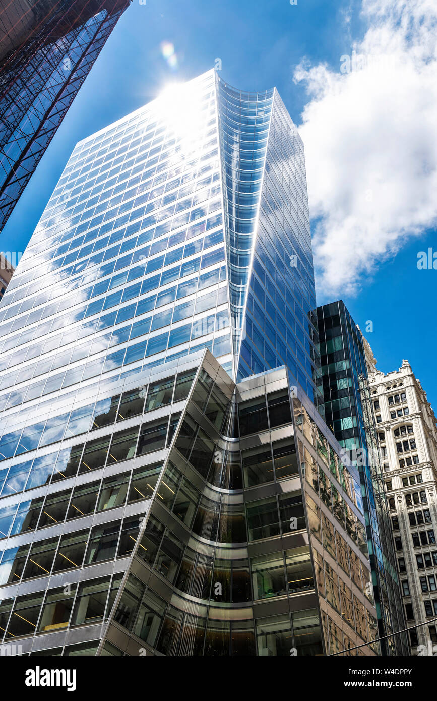 Low angle shot of modern skyscrapers and a sunbeam in Manhattan, New ...
