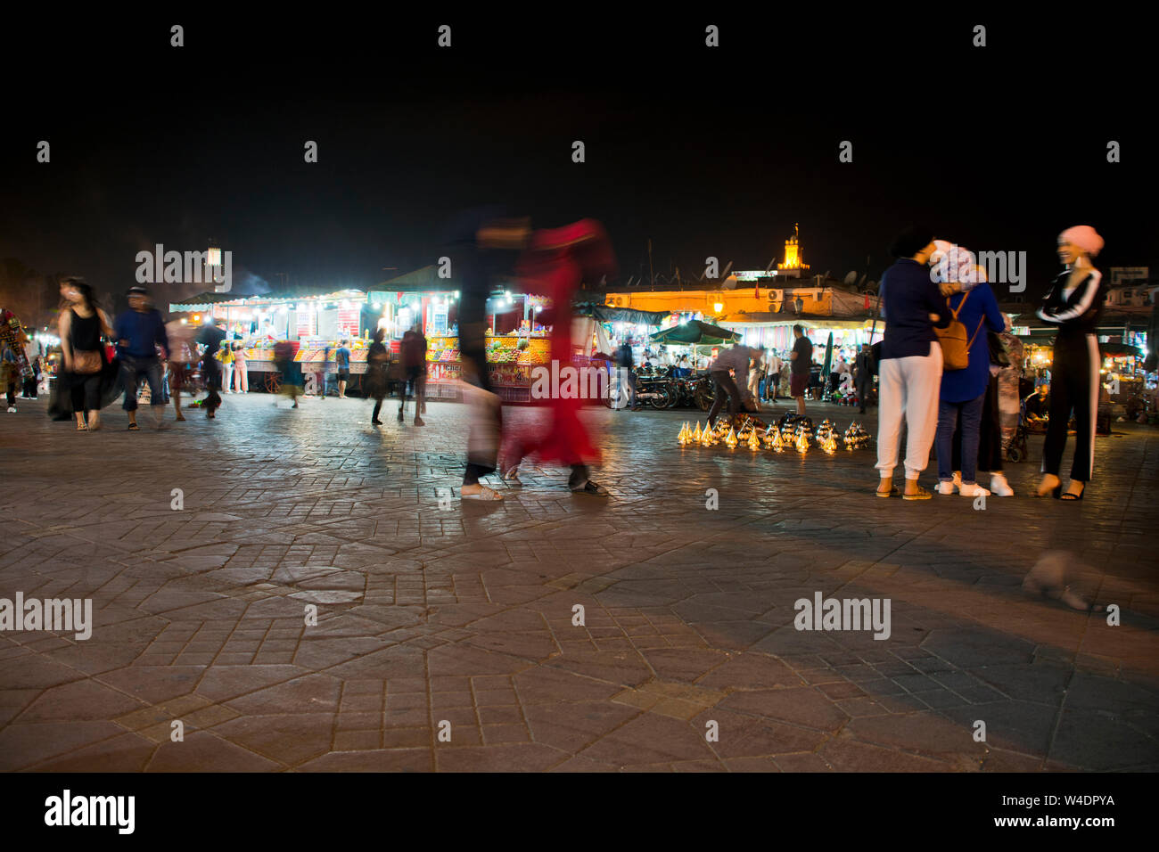 Night market in Marrakech Jema el Fna Evening gathering of locals and ...