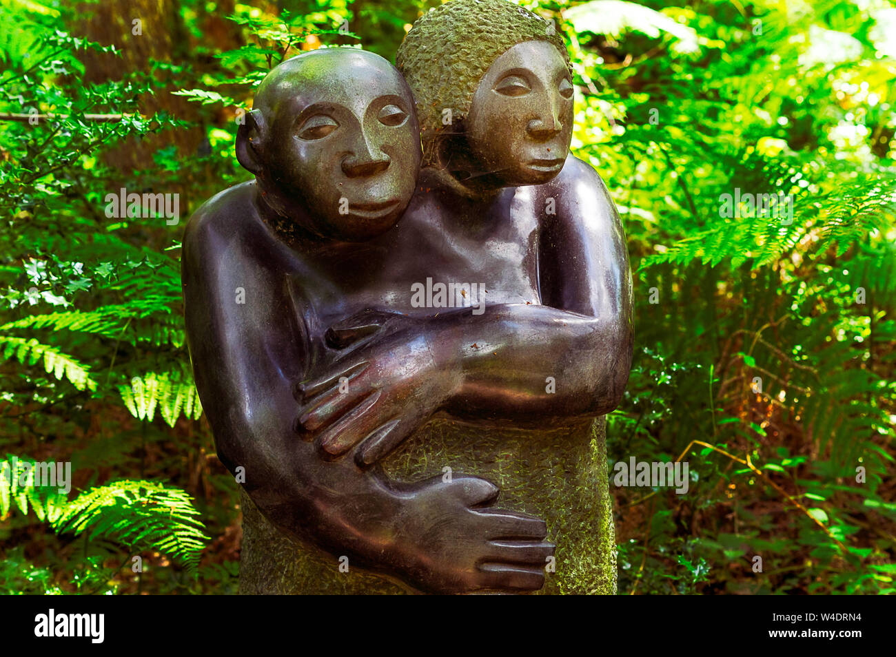 The lovers, a black stone sculpture on display in a sculpture park ...