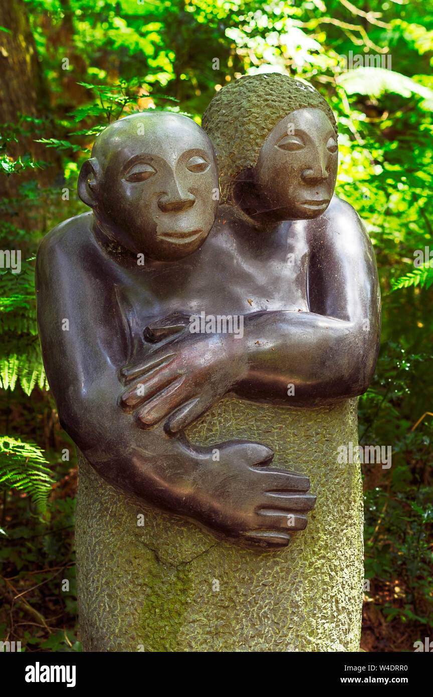 The lovers, a black stone sculpture on display in a sculpture park ...