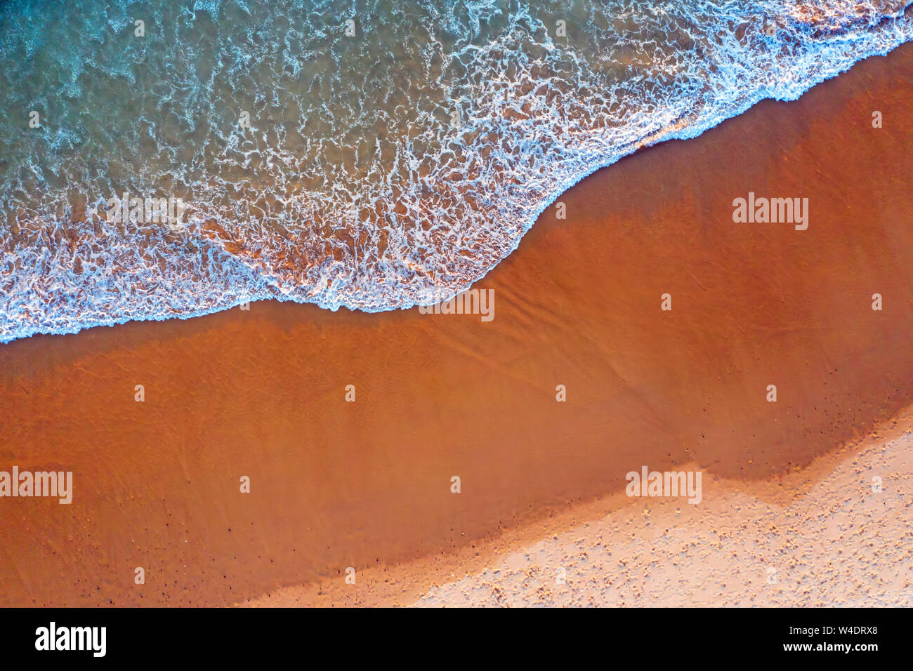 Top shot from ocean waves at the beach Stock Photo - Alamy