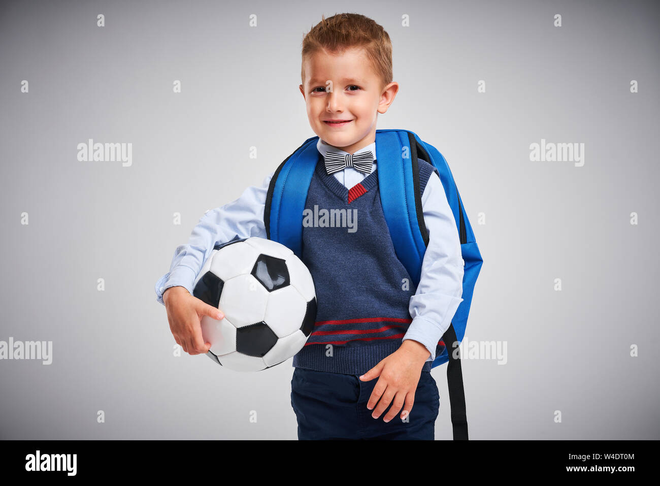 Portrait of a boy ready to school isolated on white Stock Photo - Alamy