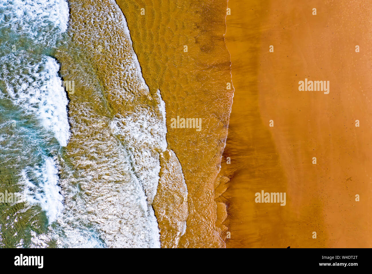 Aerial top shot from the ocean at the beach Stock Photo - Alamy