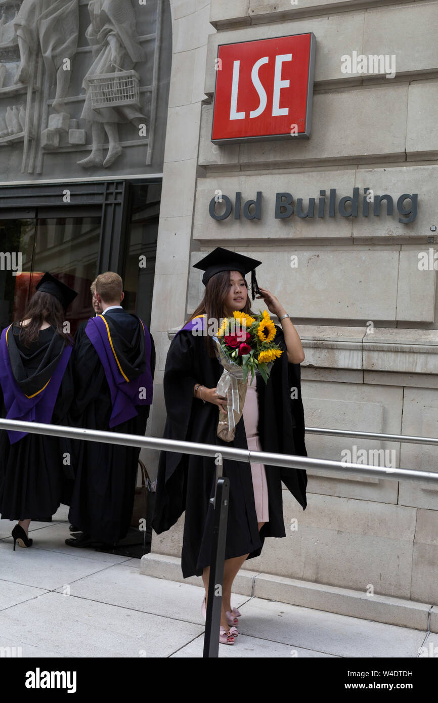 Immediately after their graduation ceremonies, new graduates meet ...