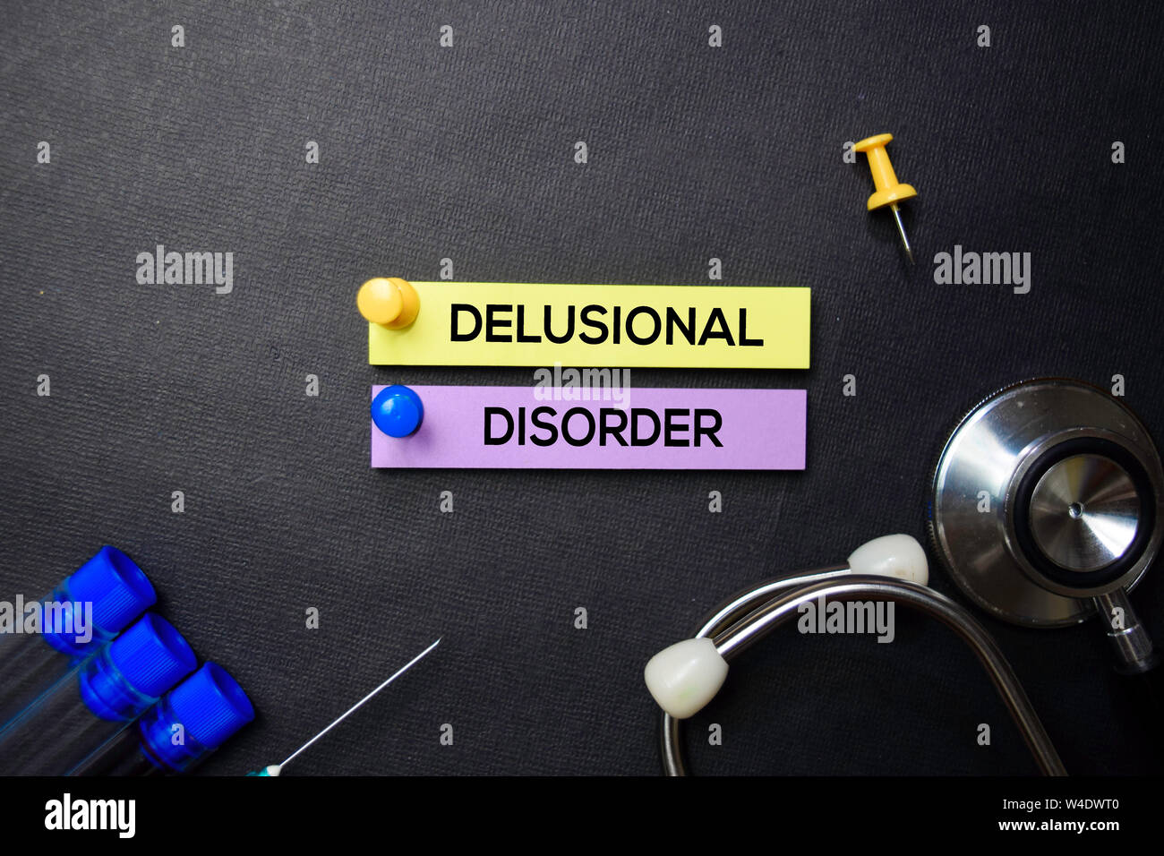 Delusional Disorder text on Sticky Notes. Top view isolated on black ...