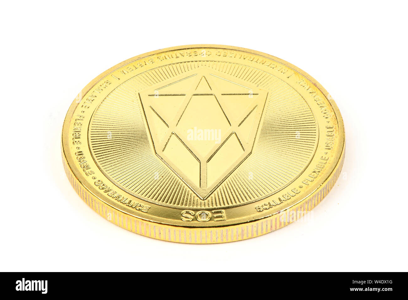 Back side of the crypto currency golden EOS isolated on white ...