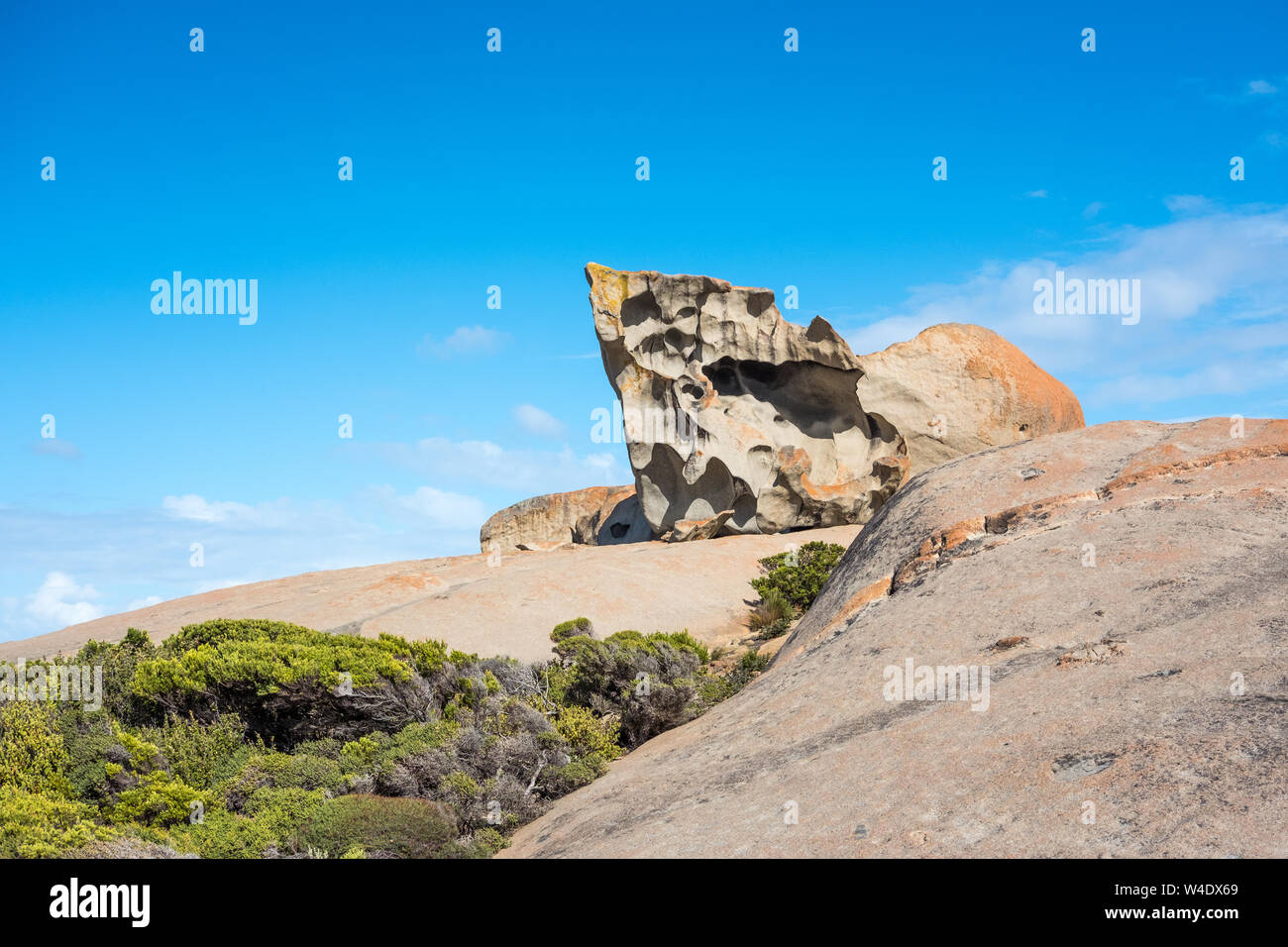 Unusual erosion of rock looks like an arrow pointing skyward. Part of ...
