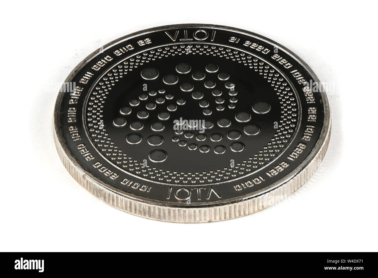 Face of the crypto currency silver iota isolated on white background ...
